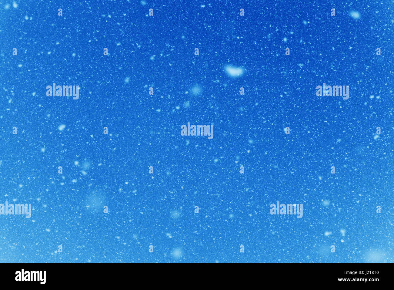 Falling snow flakes during the snowfall from the sky Stock Photo - Alamy
