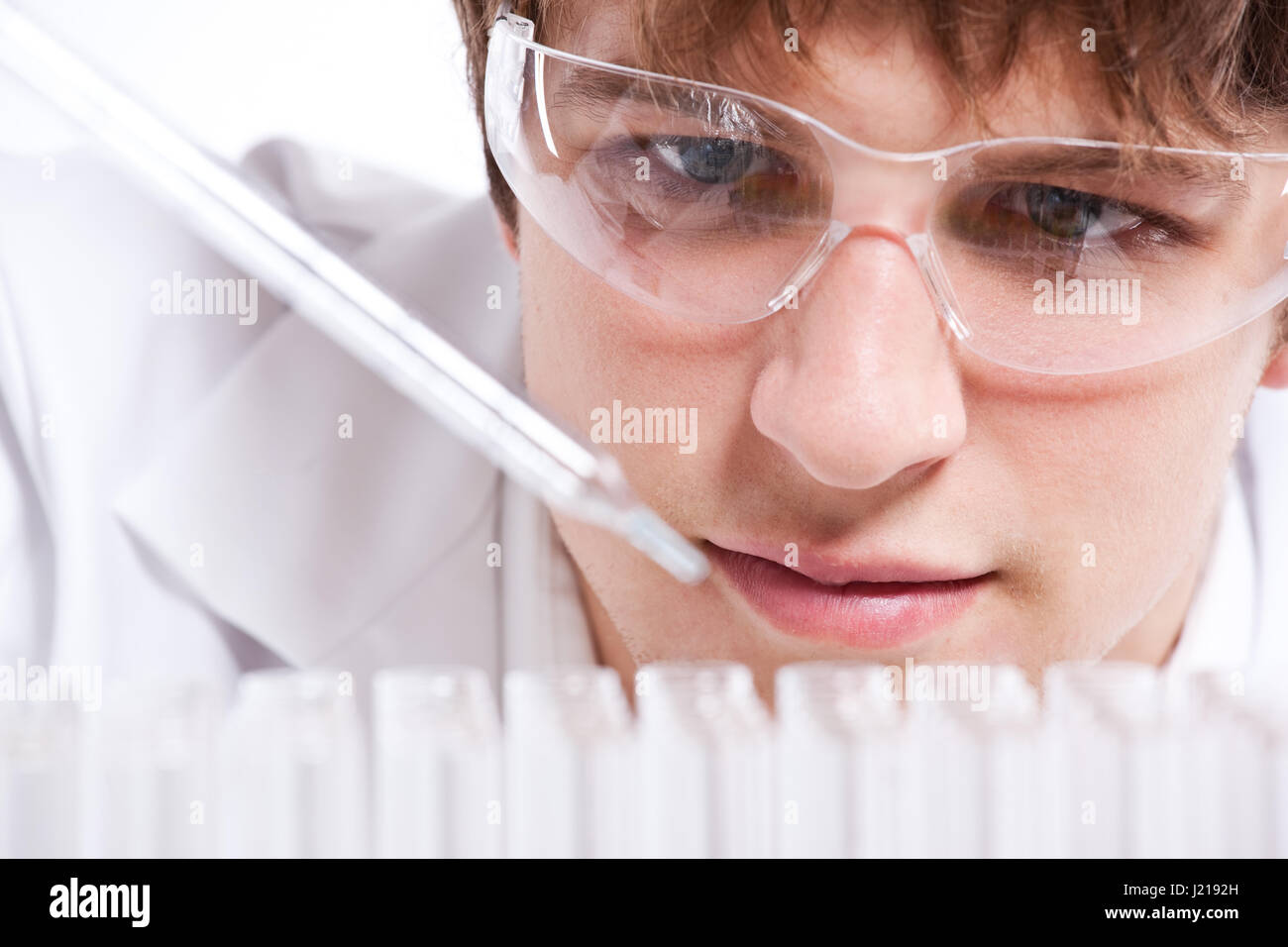 An isolated shot of a male scientist Stock Photo - Alamy