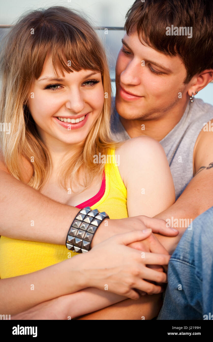 A portrait of a young caucasian couple in love outdoor Stock Photo - Alamy
