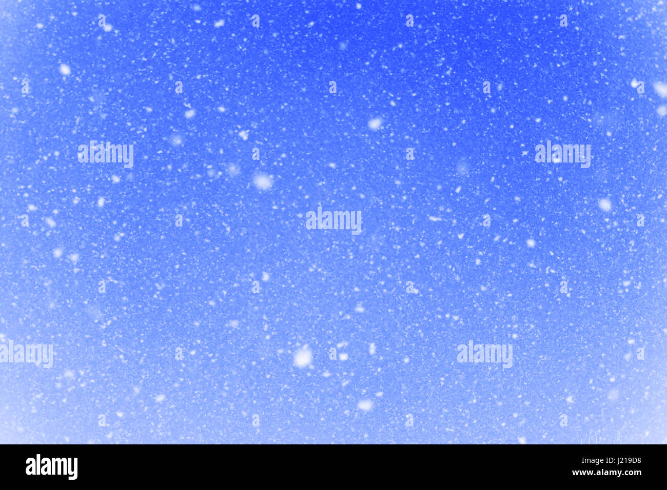 Falling snow flakes during the snowfall from the sky Stock Photo - Alamy