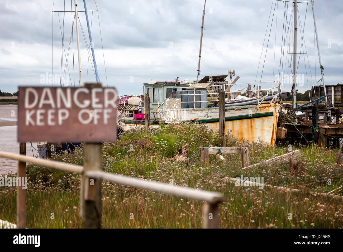 rotten old wooden boat for sale Stock Photo - Alamy