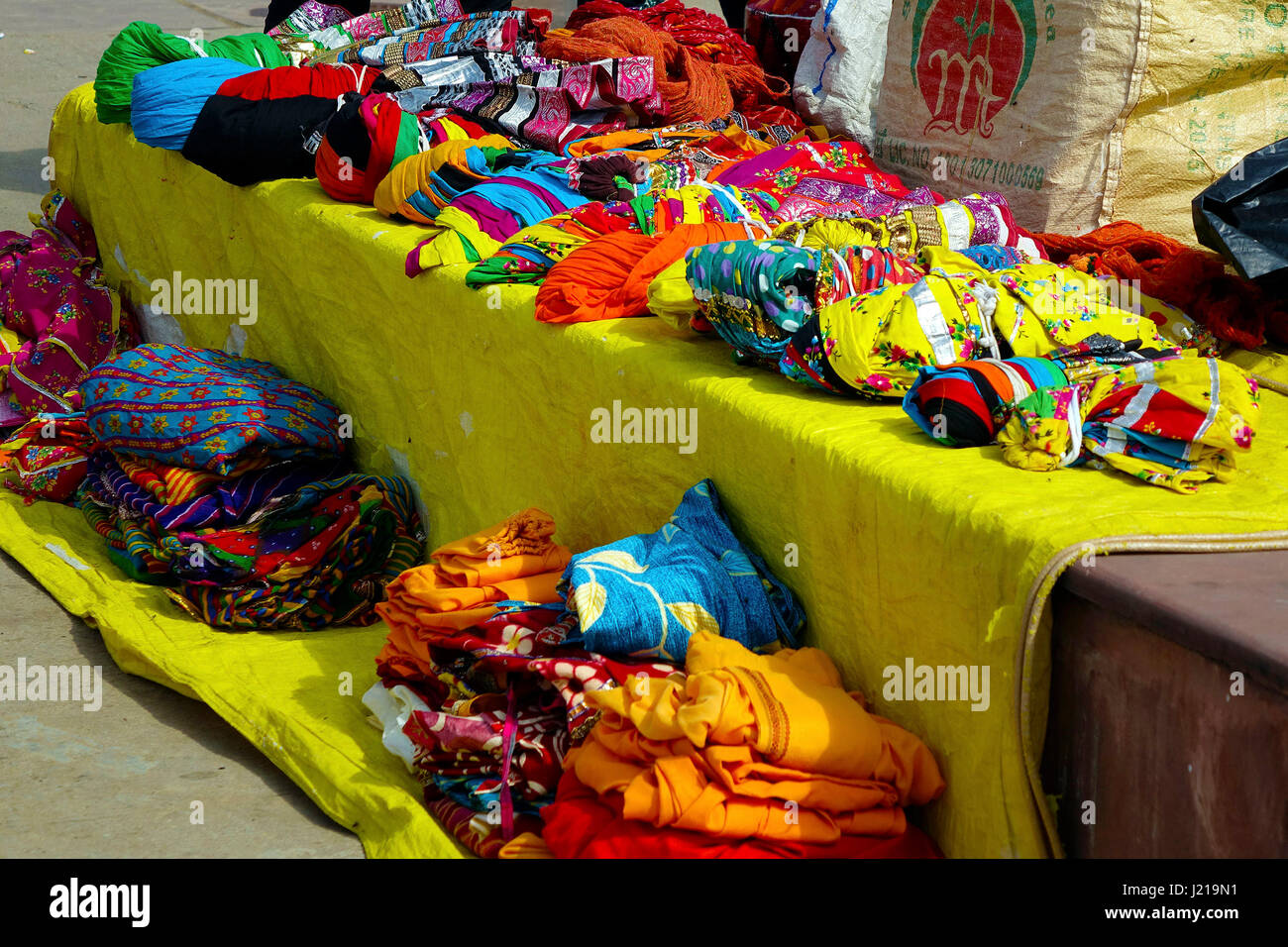 Colorful garments on sale at Indian market Stock Photo - Alamy