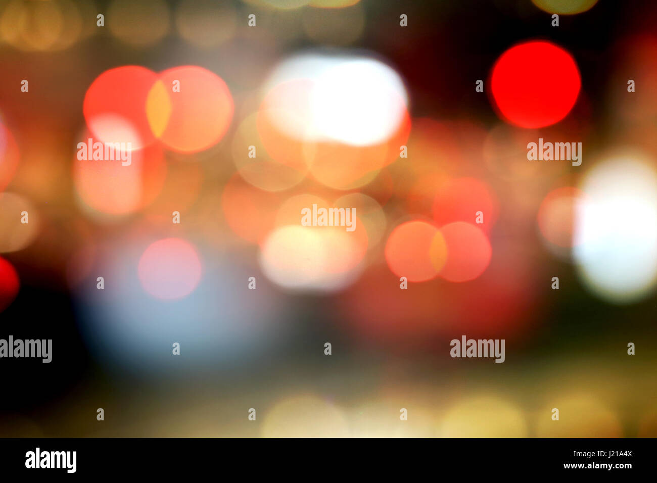 Bokeh multi-colored lights fly Stock Photo - Alamy