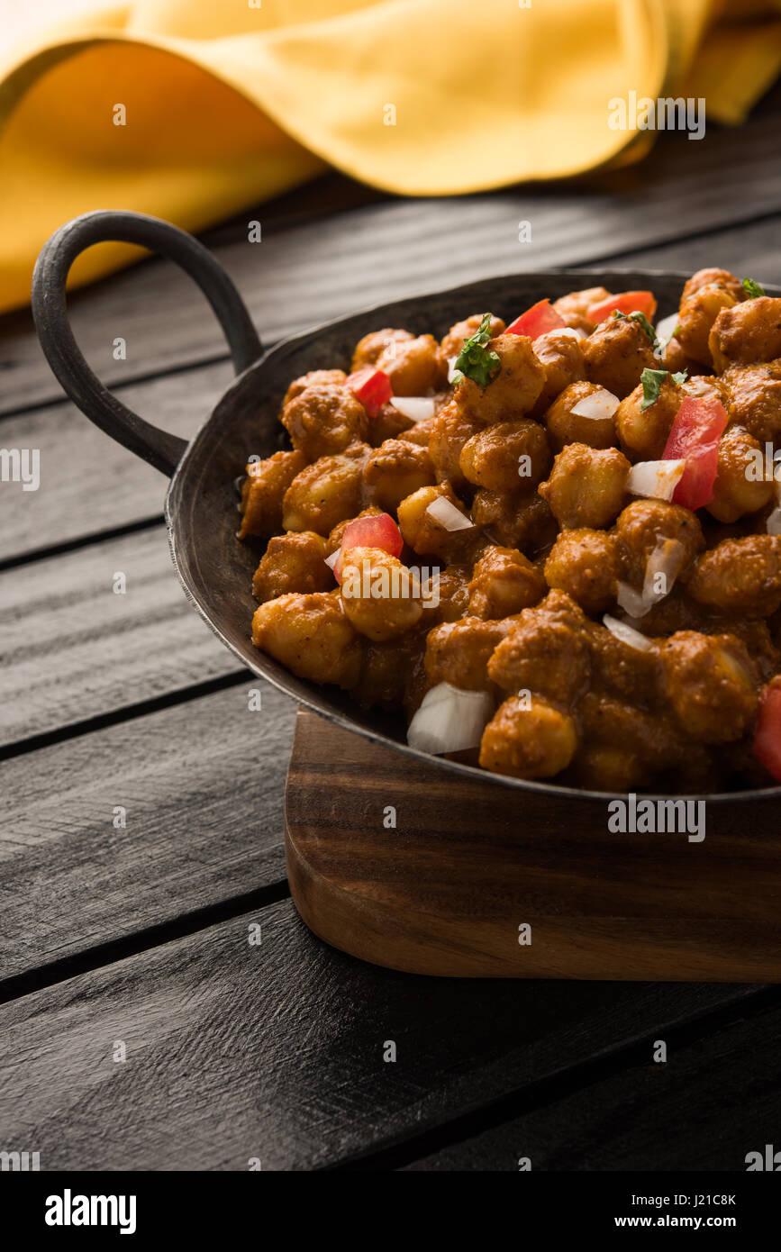 spicy chick peas curry or Chola Masala or Chana Masala or chole bhature ...