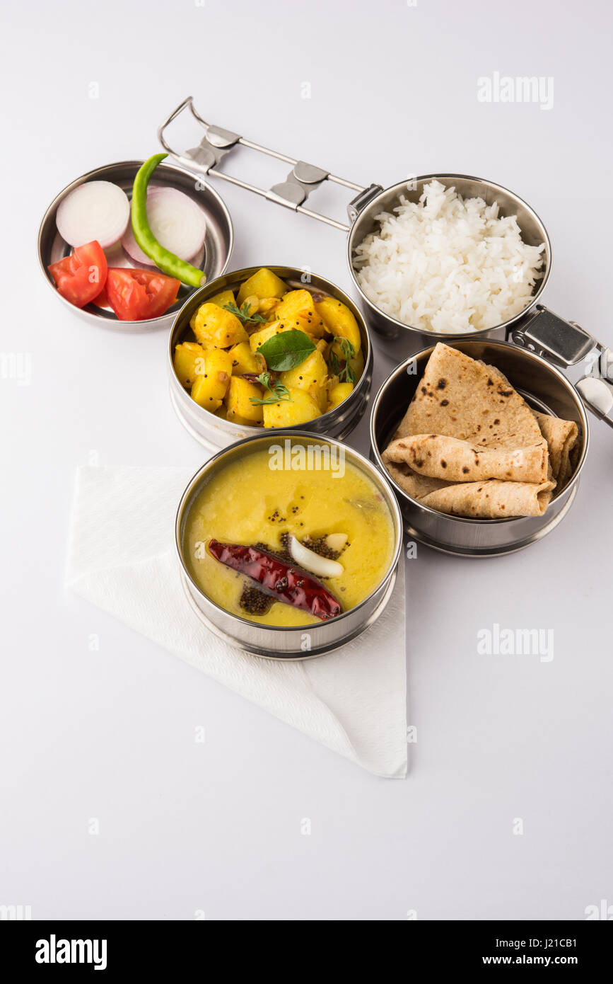 indian typical stainless steel lunch box or tiffin with north indian or ...