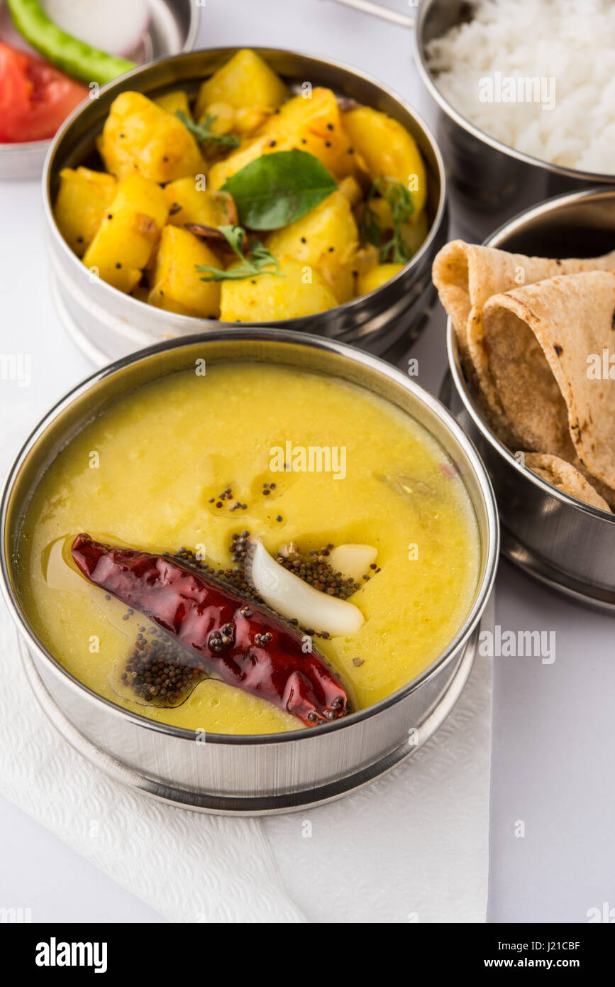 indian typical stainless steel lunch box or tiffin with north indian or ...