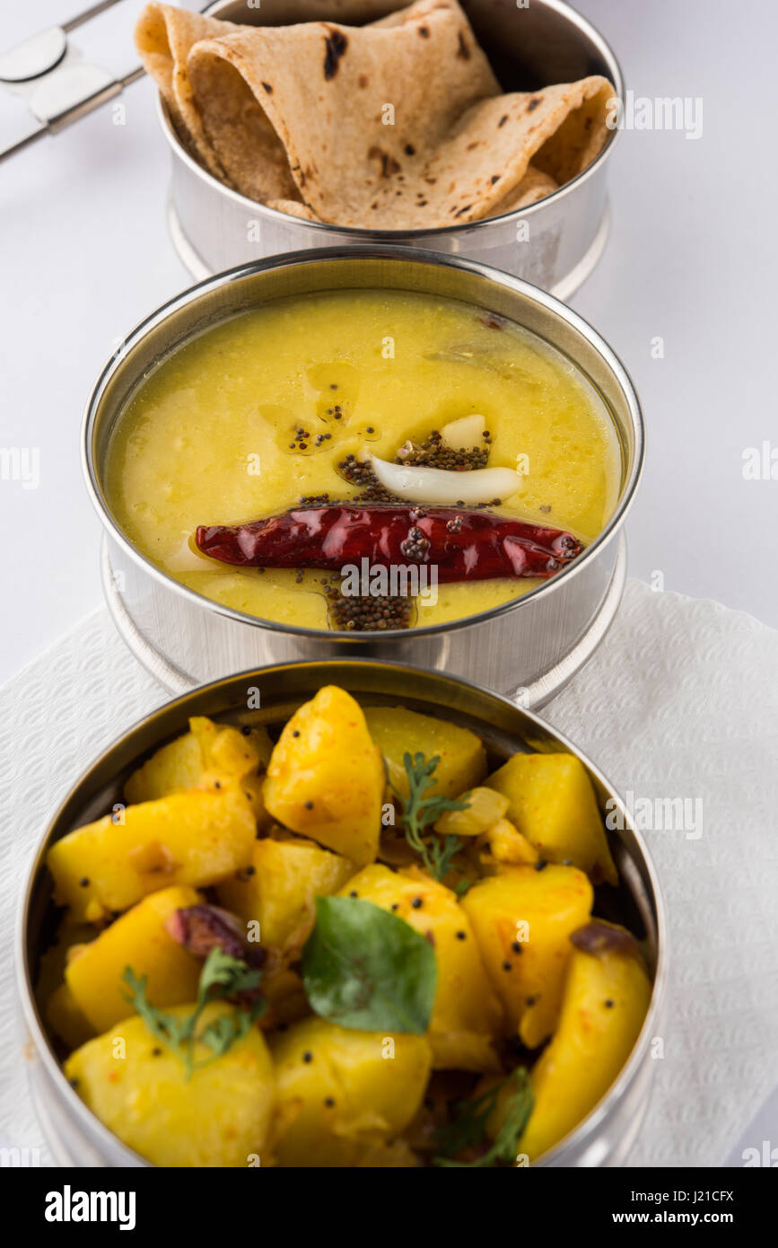 indian typical stainless steel lunch box or tiffin with north indian or ...