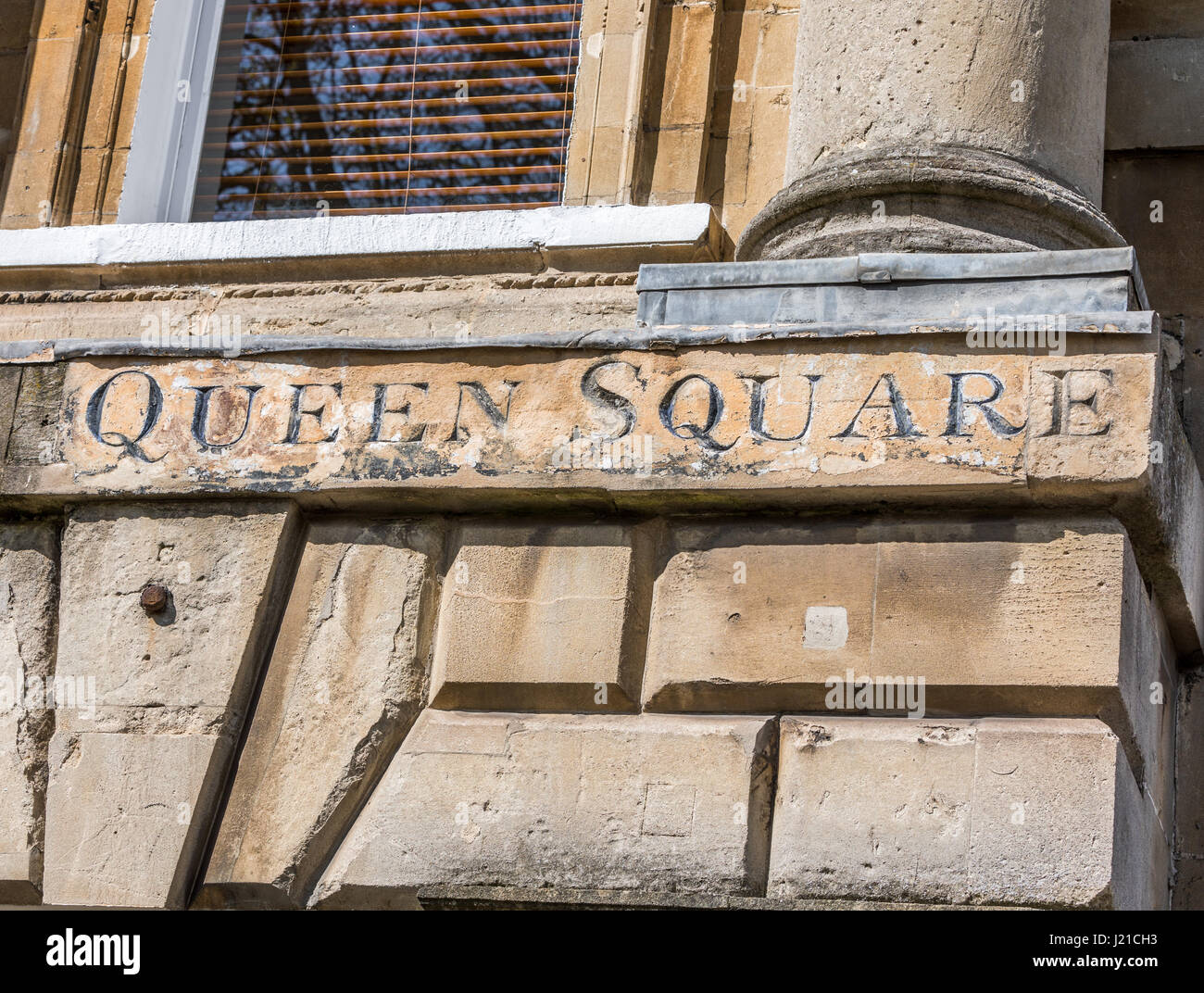 an old painted street sign for Queen Square in London England, UK Stock ...