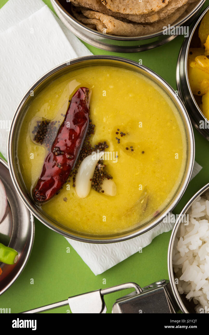 indian typical stainless steel lunch box or tiffin with north indian or ...