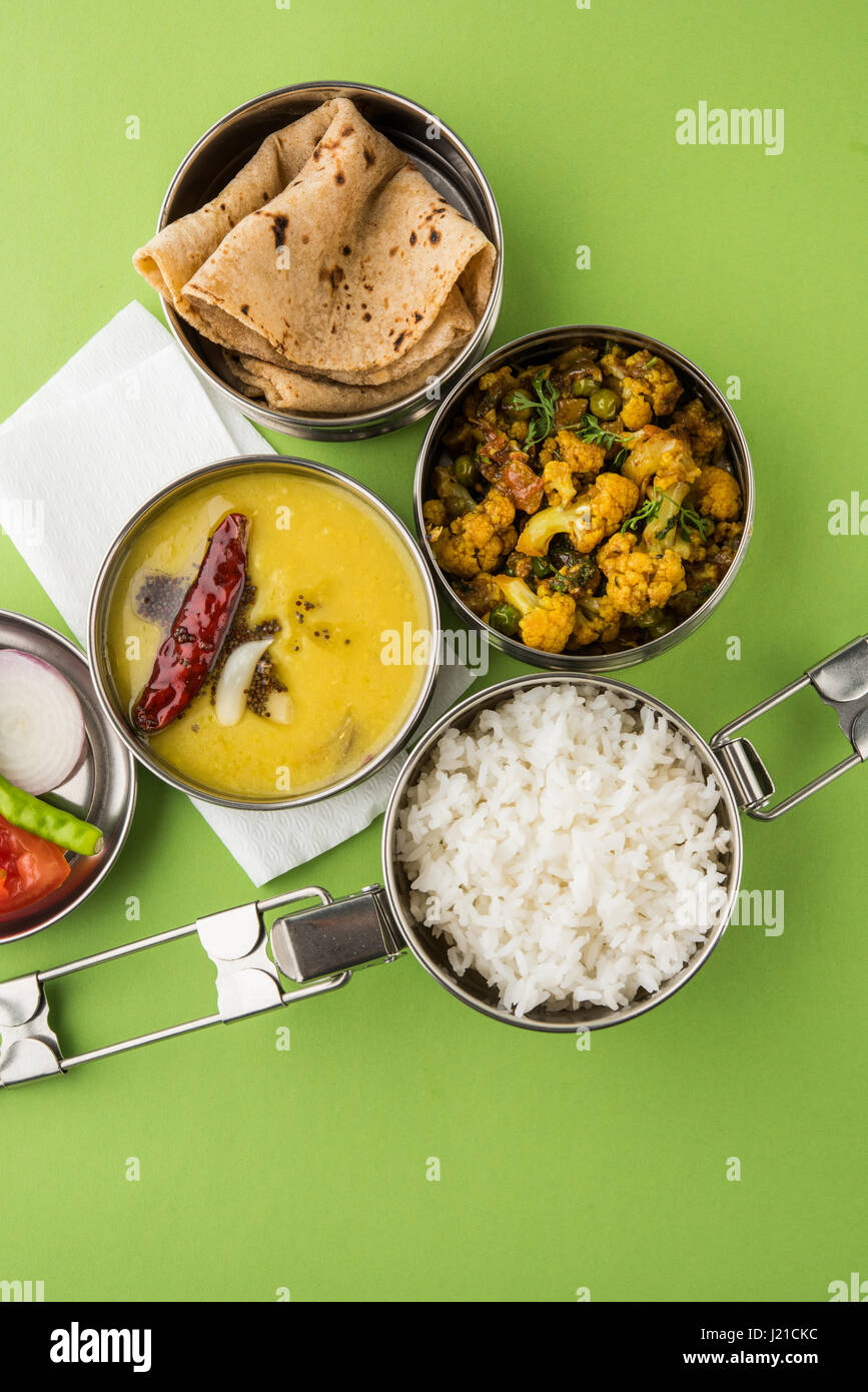 indian typical stainless steel lunch box or tiffin with north indian or ...