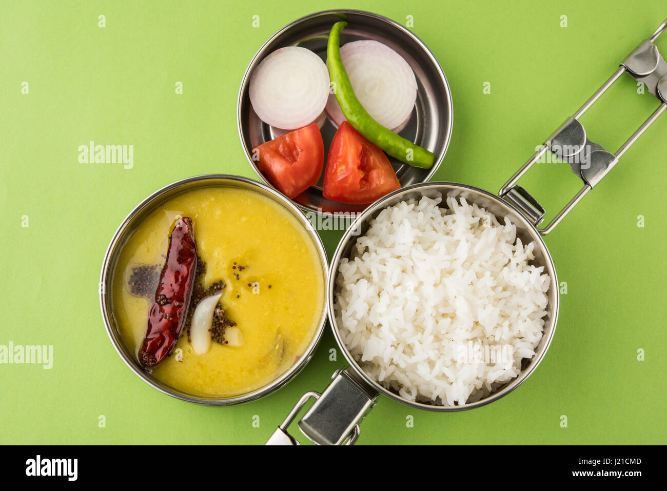 indian typical stainless steel lunch box or tiffin with north indian or ...