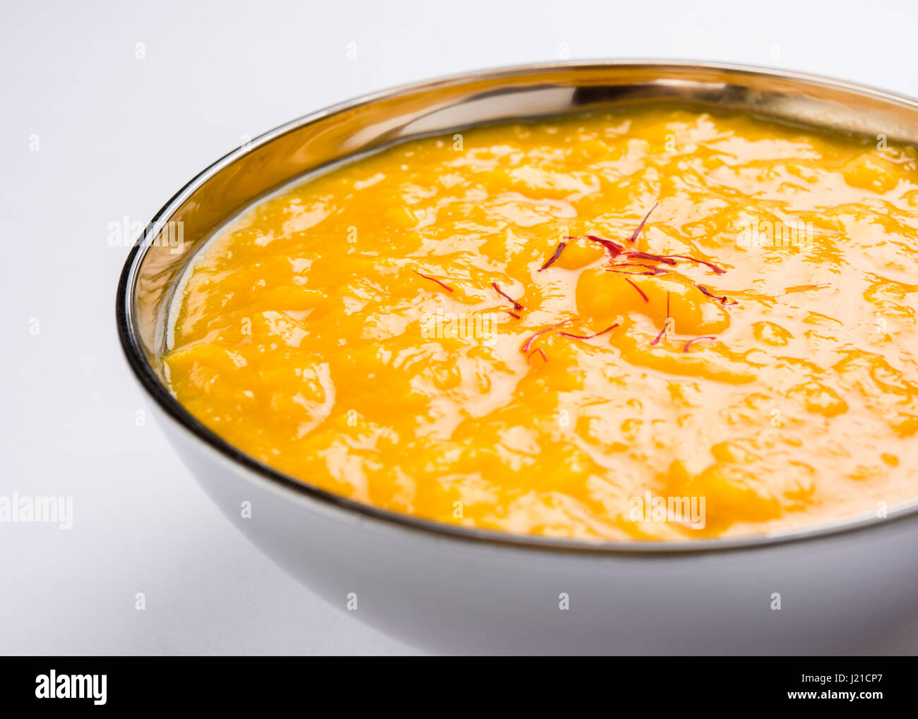 alphonso mango pulp or hapus aam ras or amba ras in marathi, selective ...