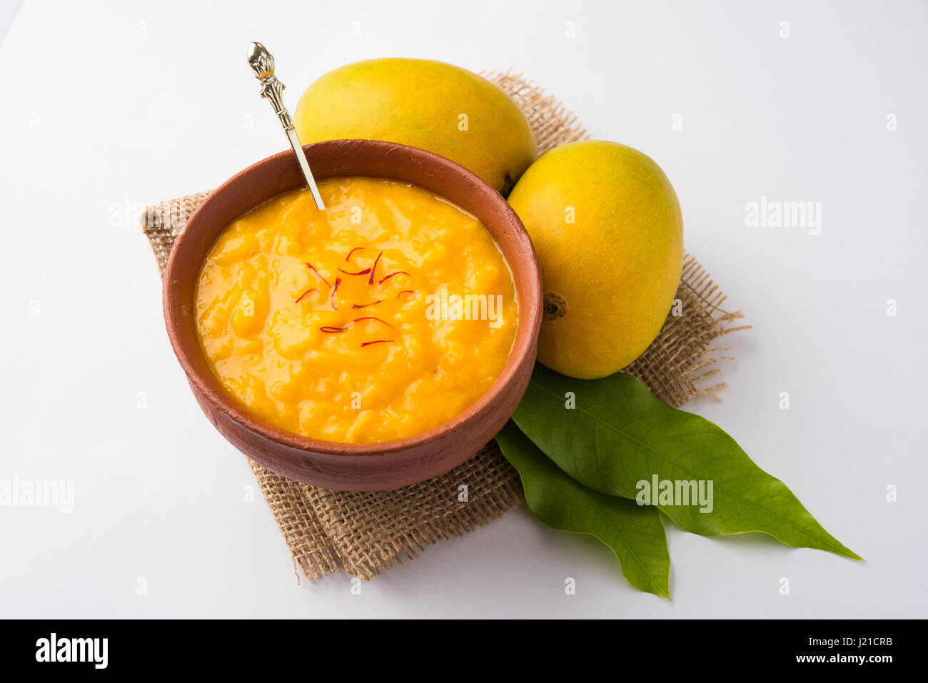 alphonso mango pulp or hapus aam ras or amba ras in marathi, selective ...
