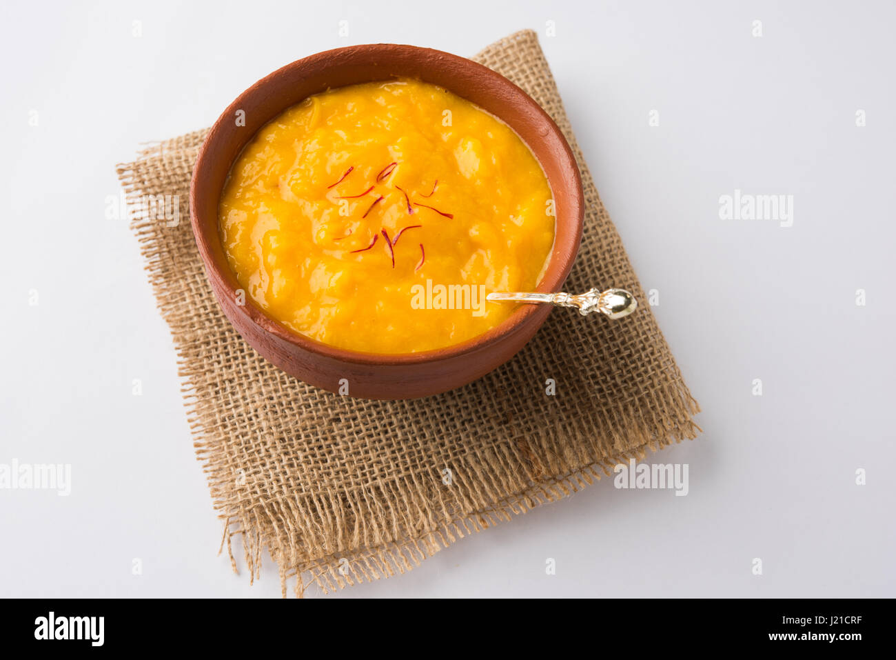 alphonso mango pulp or hapus aam ras or amba ras in marathi, selective ...