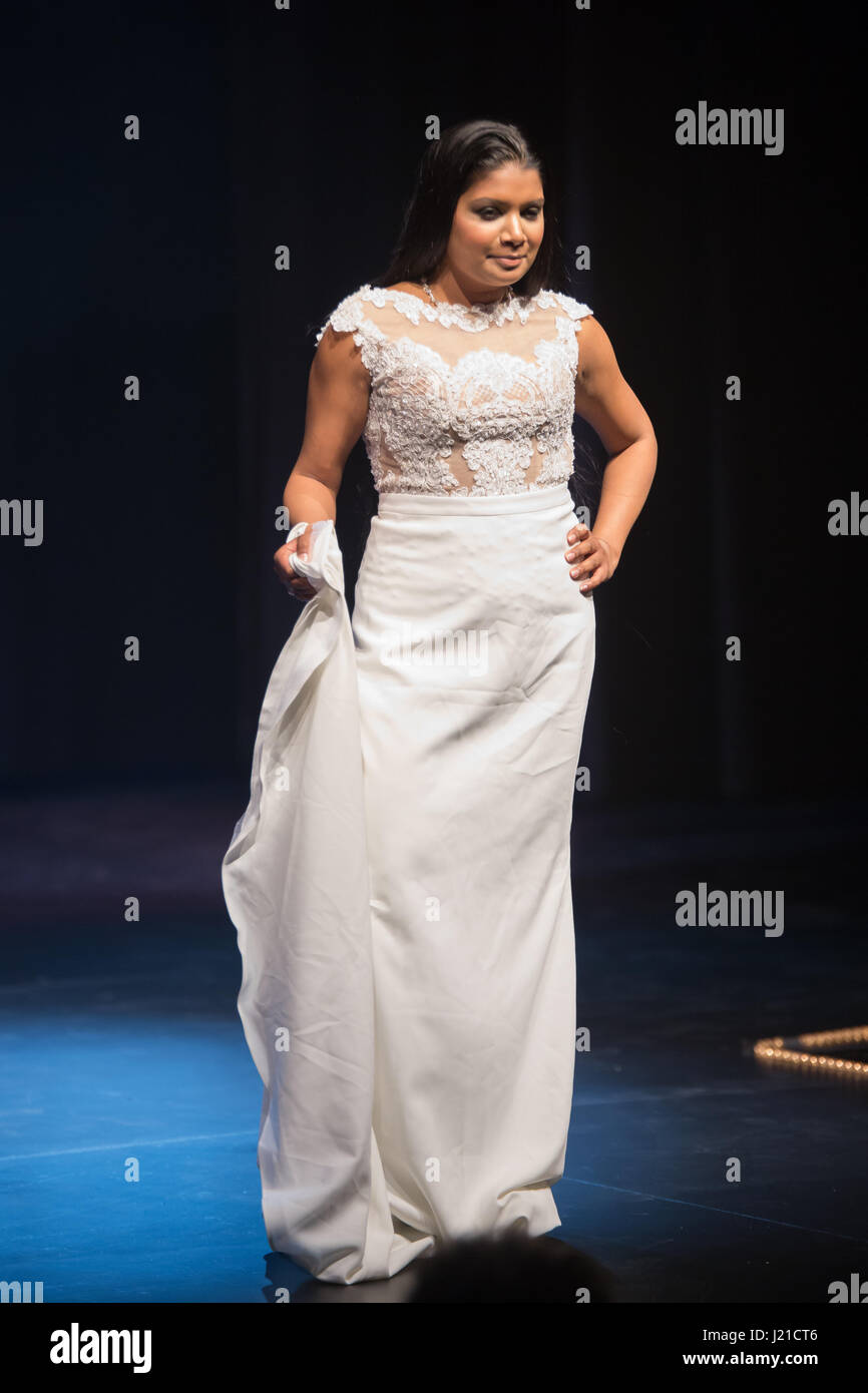 female bridal outfit on stage Stock Photo - Alamy