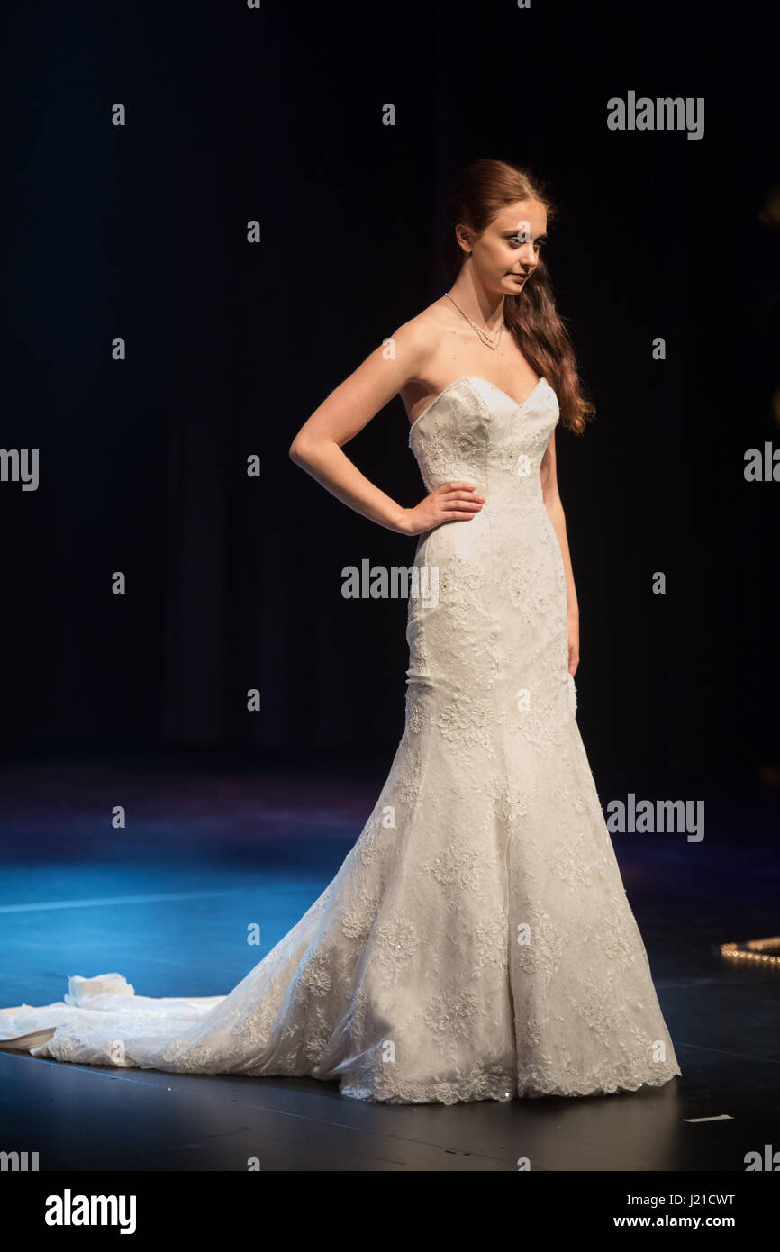 female bridal outfit on stage Stock Photo - Alamy