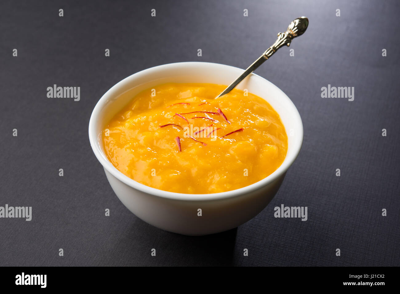alphonso mango pulp or hapus aam ras or amba ras in marathi, selective ...