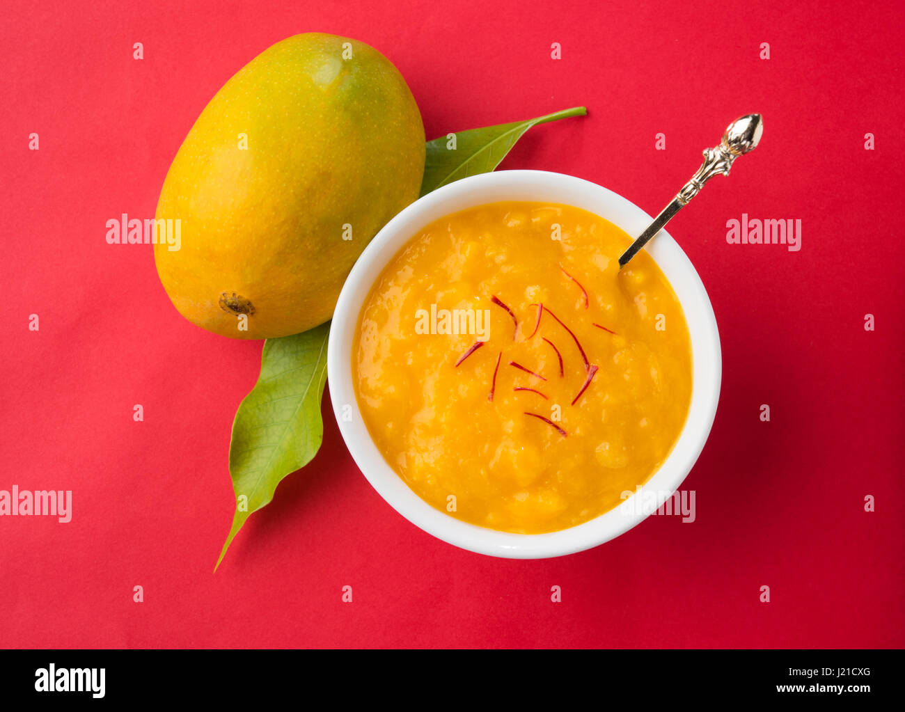 alphonso mango pulp or hapus aam ras or amba ras in marathi, selective ...