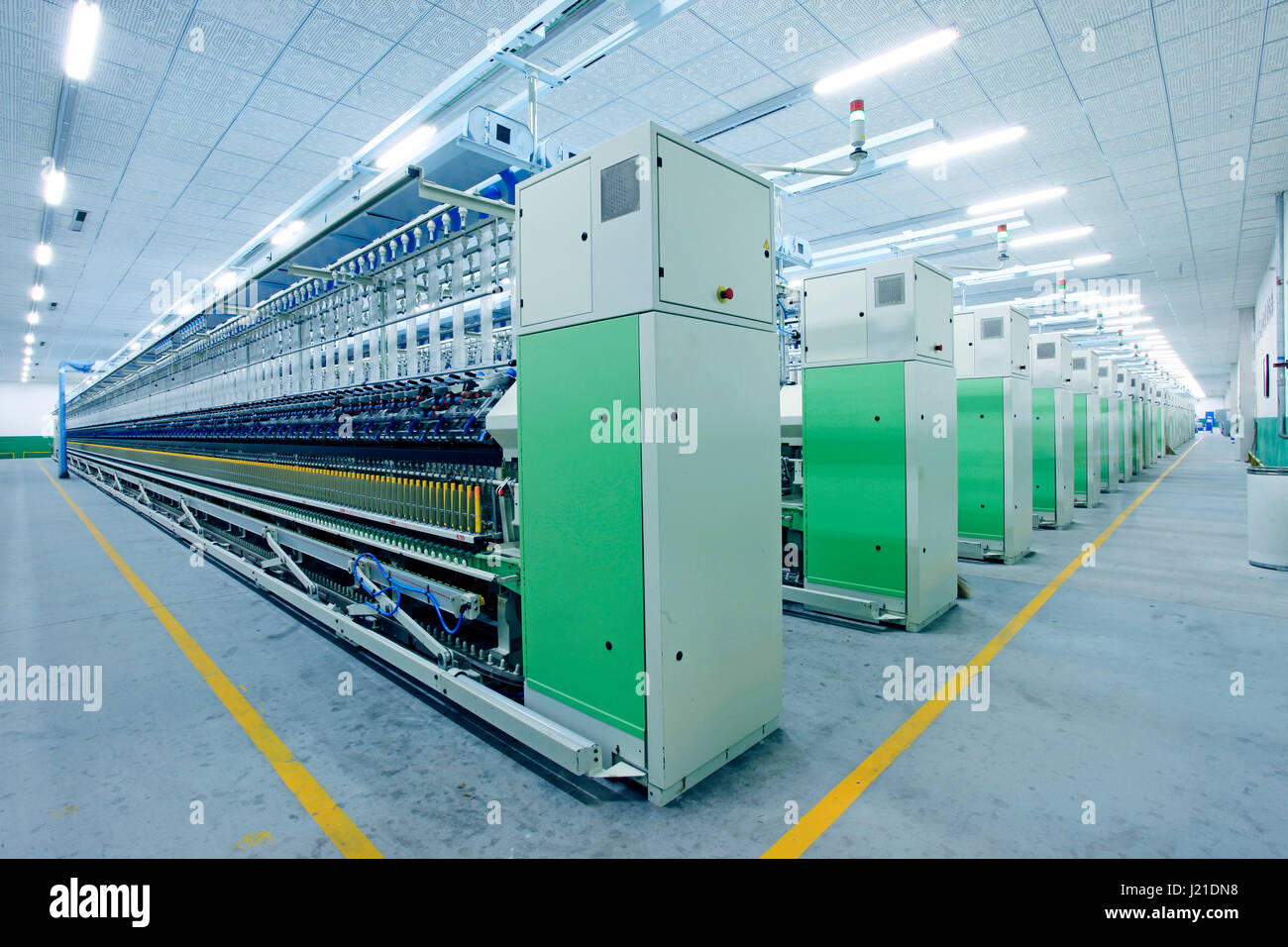 The spinning mill workshop equipment Stock Photo - Alamy