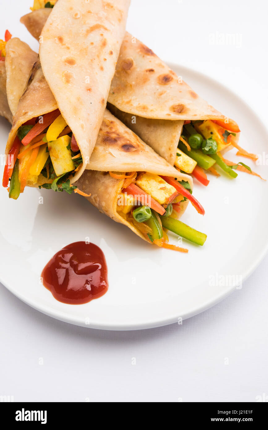 Indian popular snack food called Vegetable spring rolls or veg roll or ...