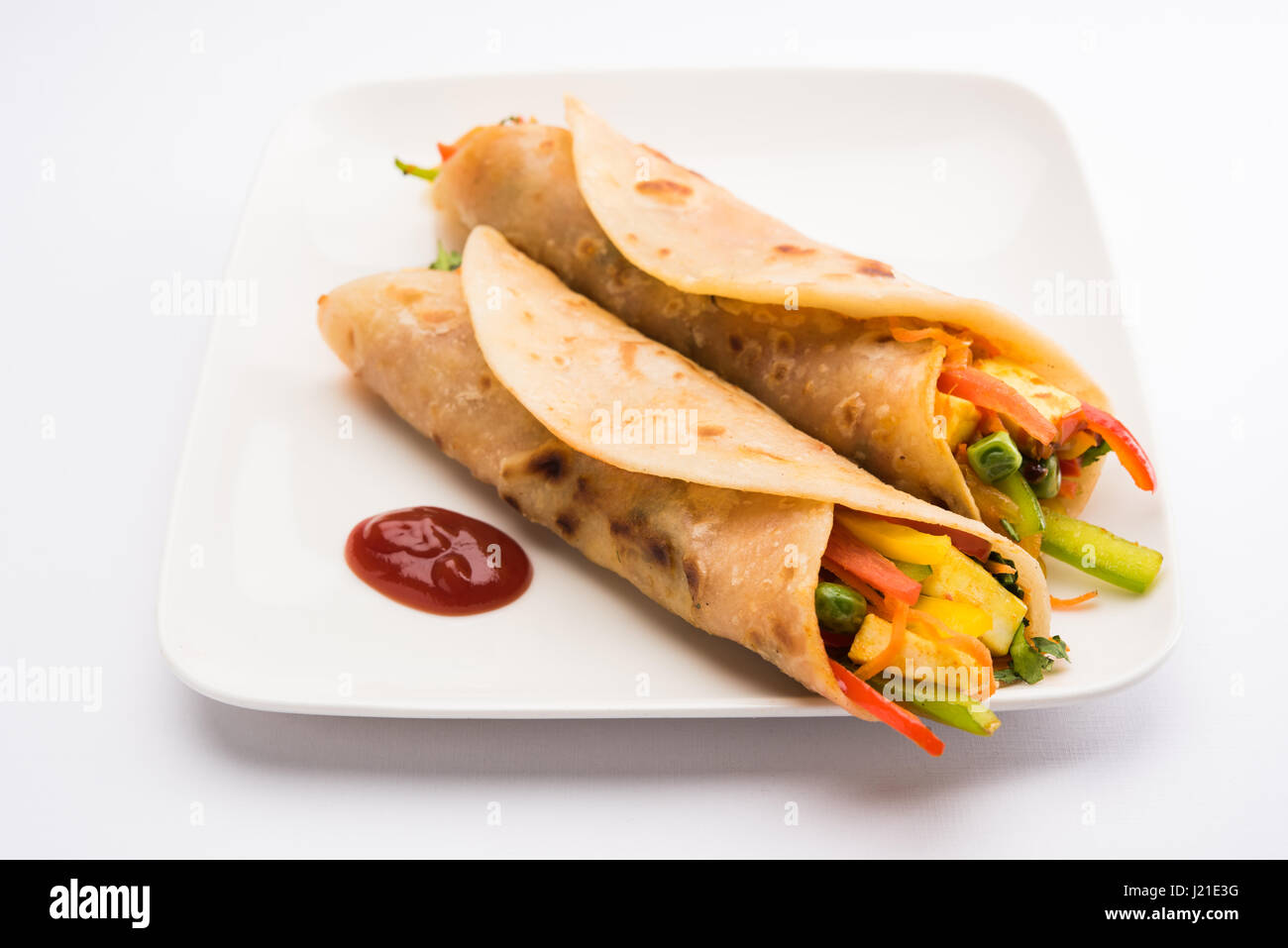 Indian popular snack food called Vegetable spring rolls or veg roll or ...