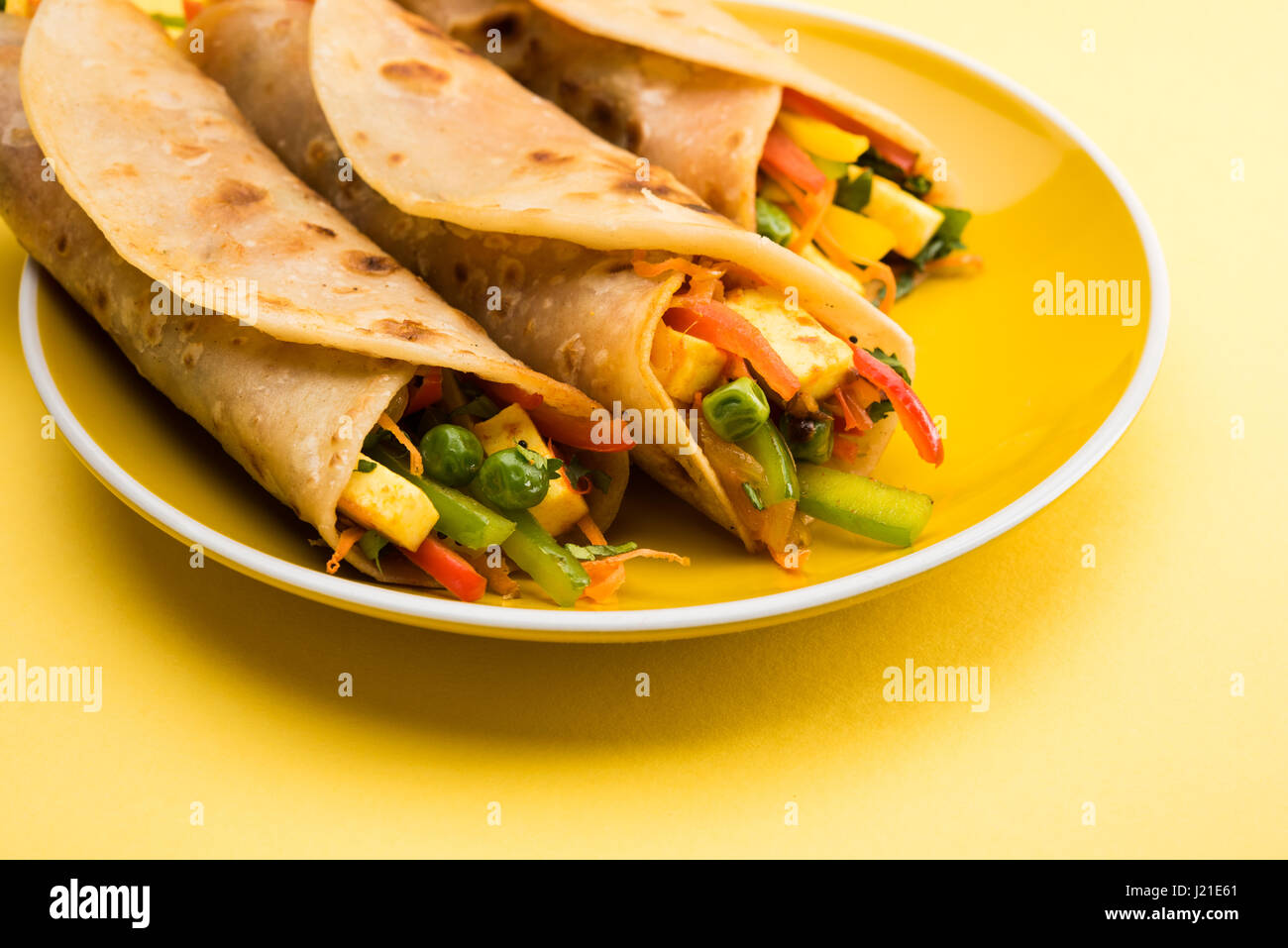 Indian popular snack food called Vegetable spring rolls or veg roll or ...