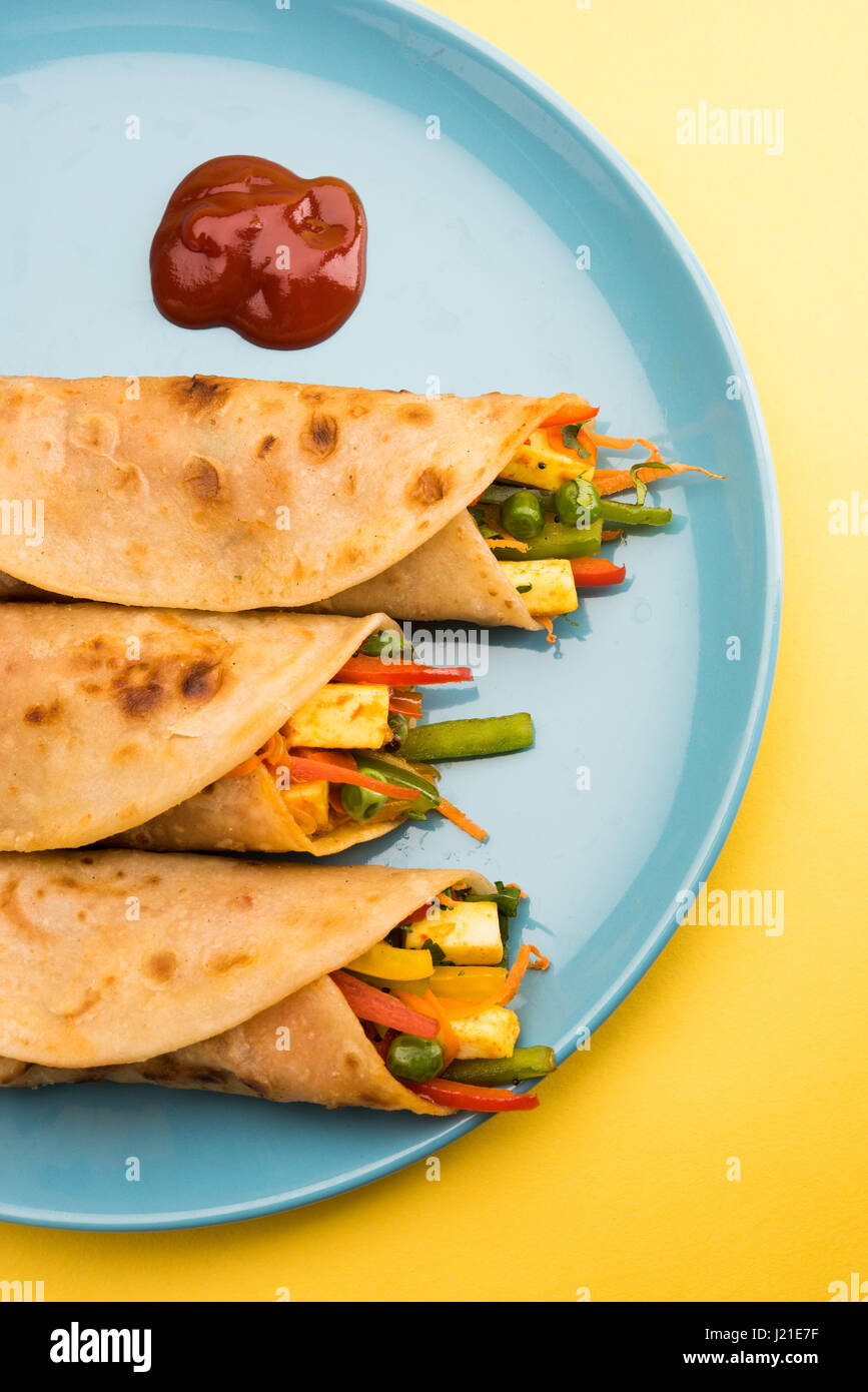 Indian popular snack food called Vegetable spring rolls or veg roll or ...