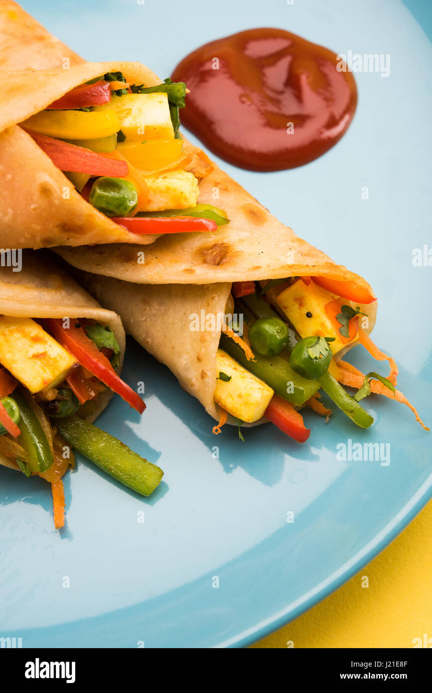 Indian popular snack food called Vegetable spring rolls or veg roll or ...