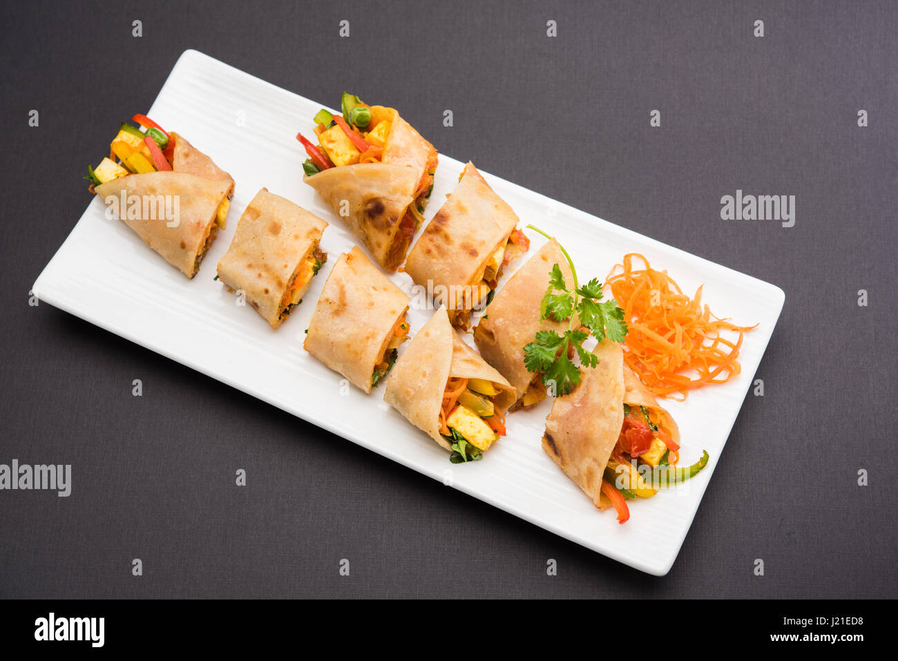 Indian popular snack food called Vegetable spring rolls or veg roll or ...