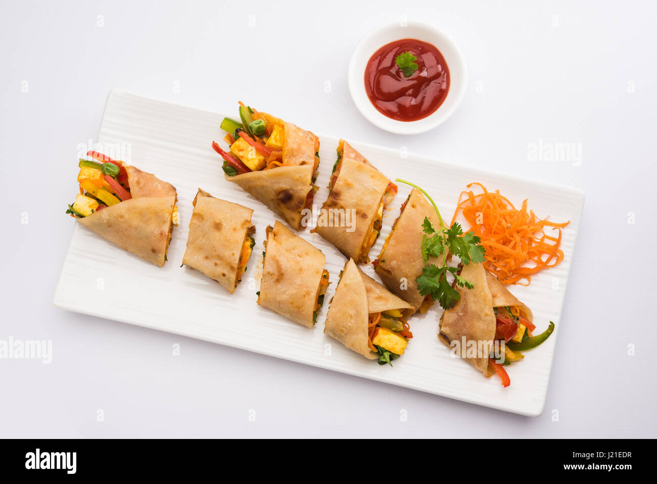 Indian popular snack food called Vegetable spring rolls or veg roll or ...