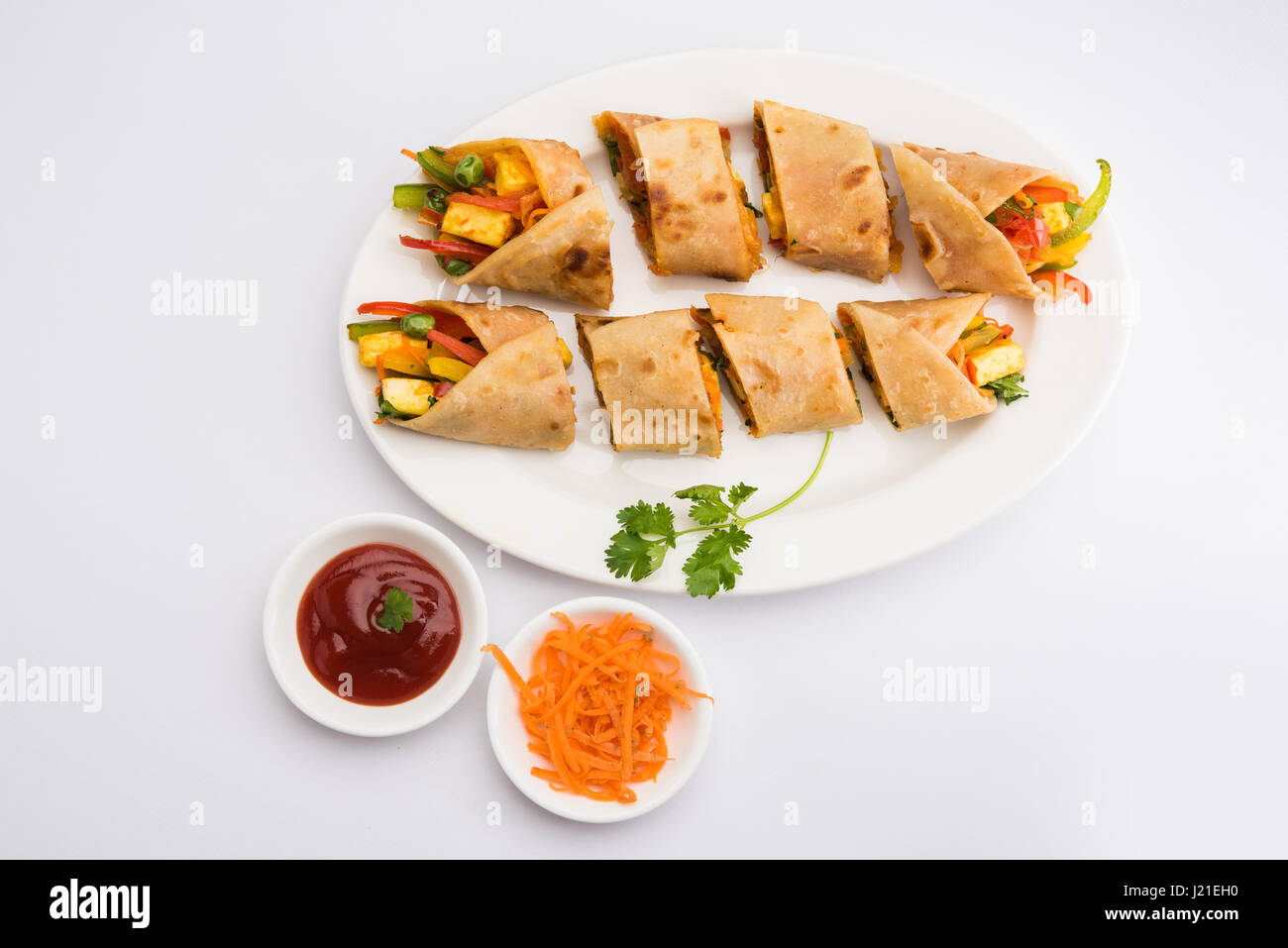 Indian popular snack food called Vegetable spring rolls or veg roll or ...