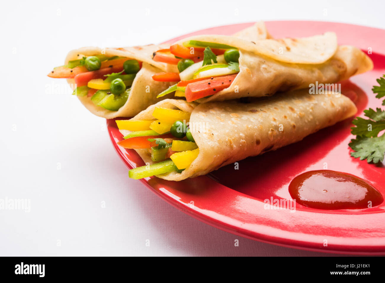Indian popular snack food called Vegetable spring rolls or veg roll or ...