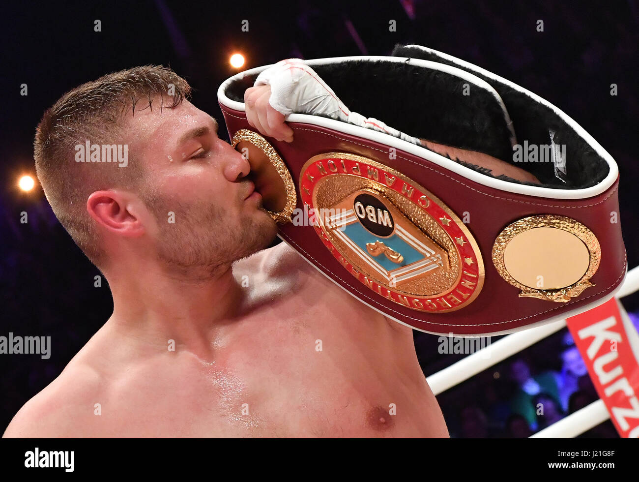 Tom Schwarz kisses the belt after the WBO Inter Conti Championships ...