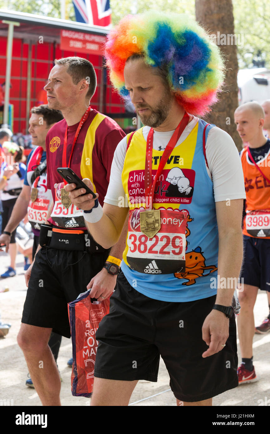 London, UK. 23rd Apr, 2017. Runners finish the 37th London Marathon on ...