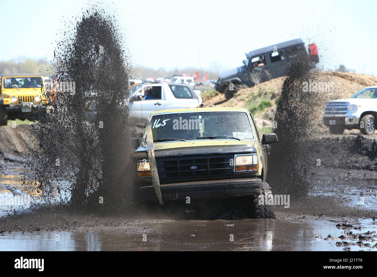 Trucks In Mud Pits