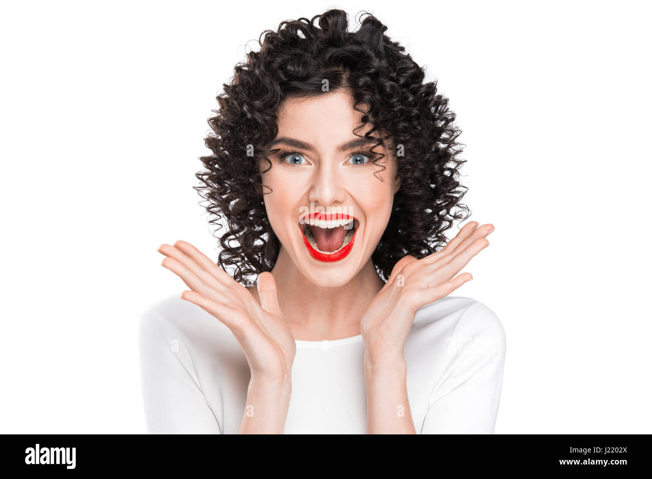 Surprised excited beautiful woman screaming amazed in joy, isolated on ...