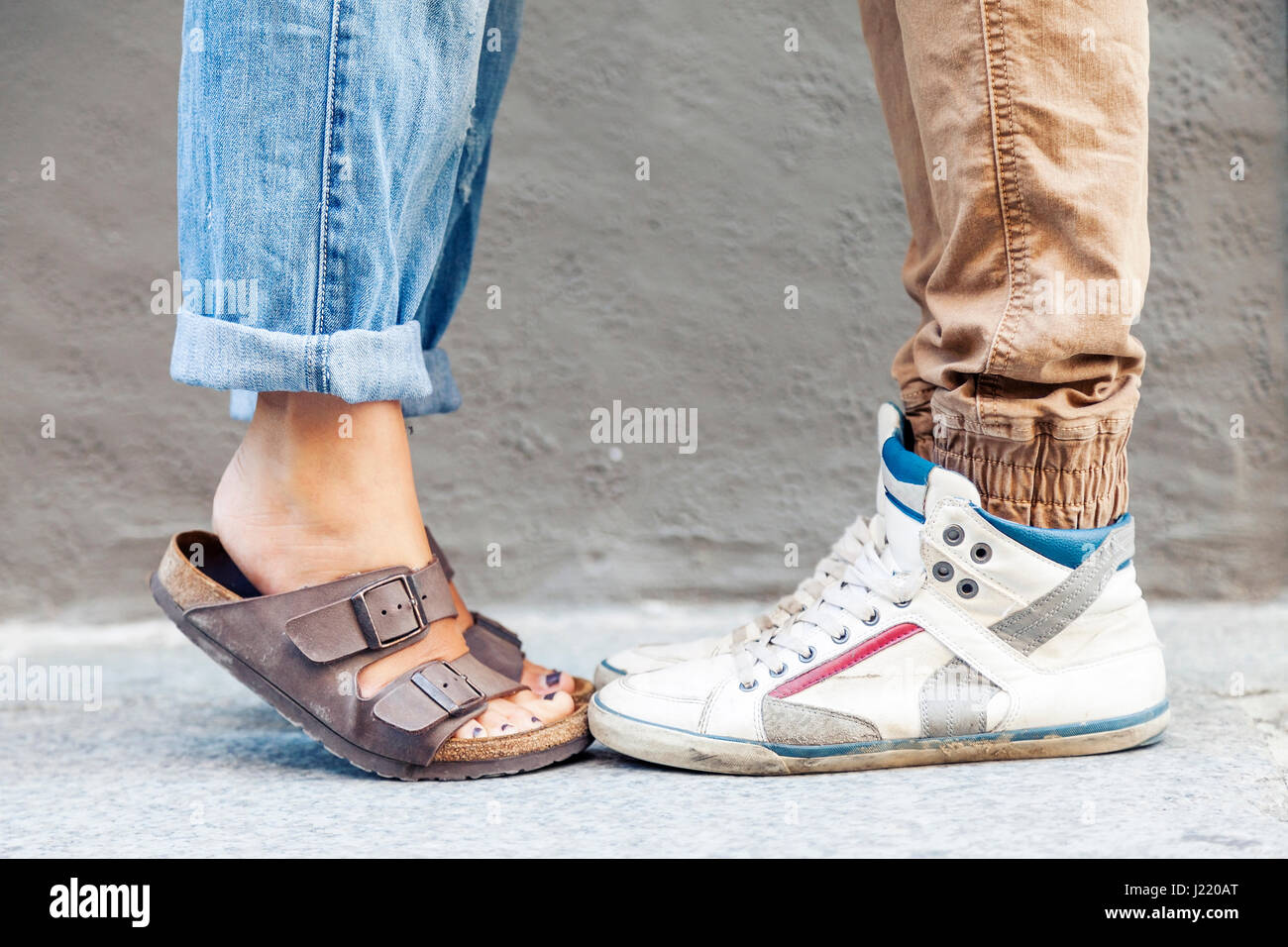 male and female legs meeting for kiss Stock Photo - Alamy