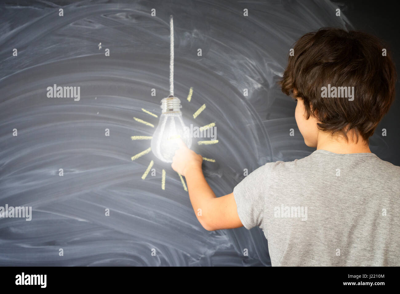 Teenager boy getting an idea Stock Photo - Alamy