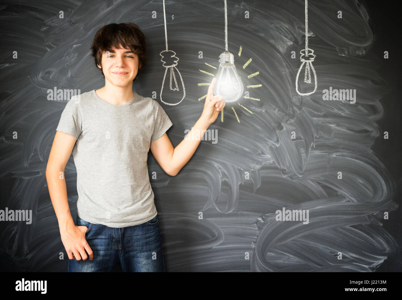 Teenager boy getting an idea Stock Photo - Alamy