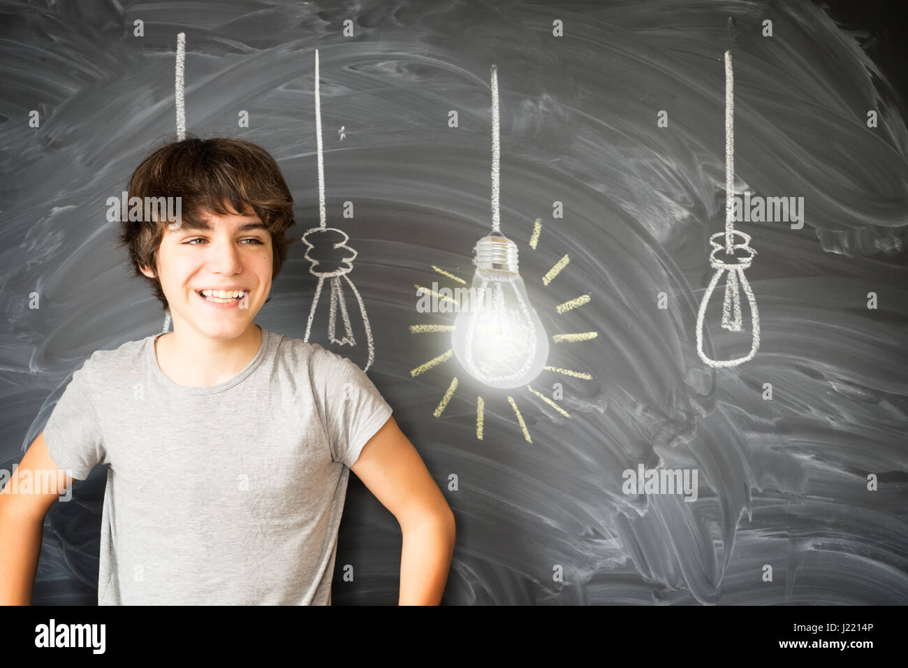 Teenager boy getting an idea Stock Photo - Alamy
