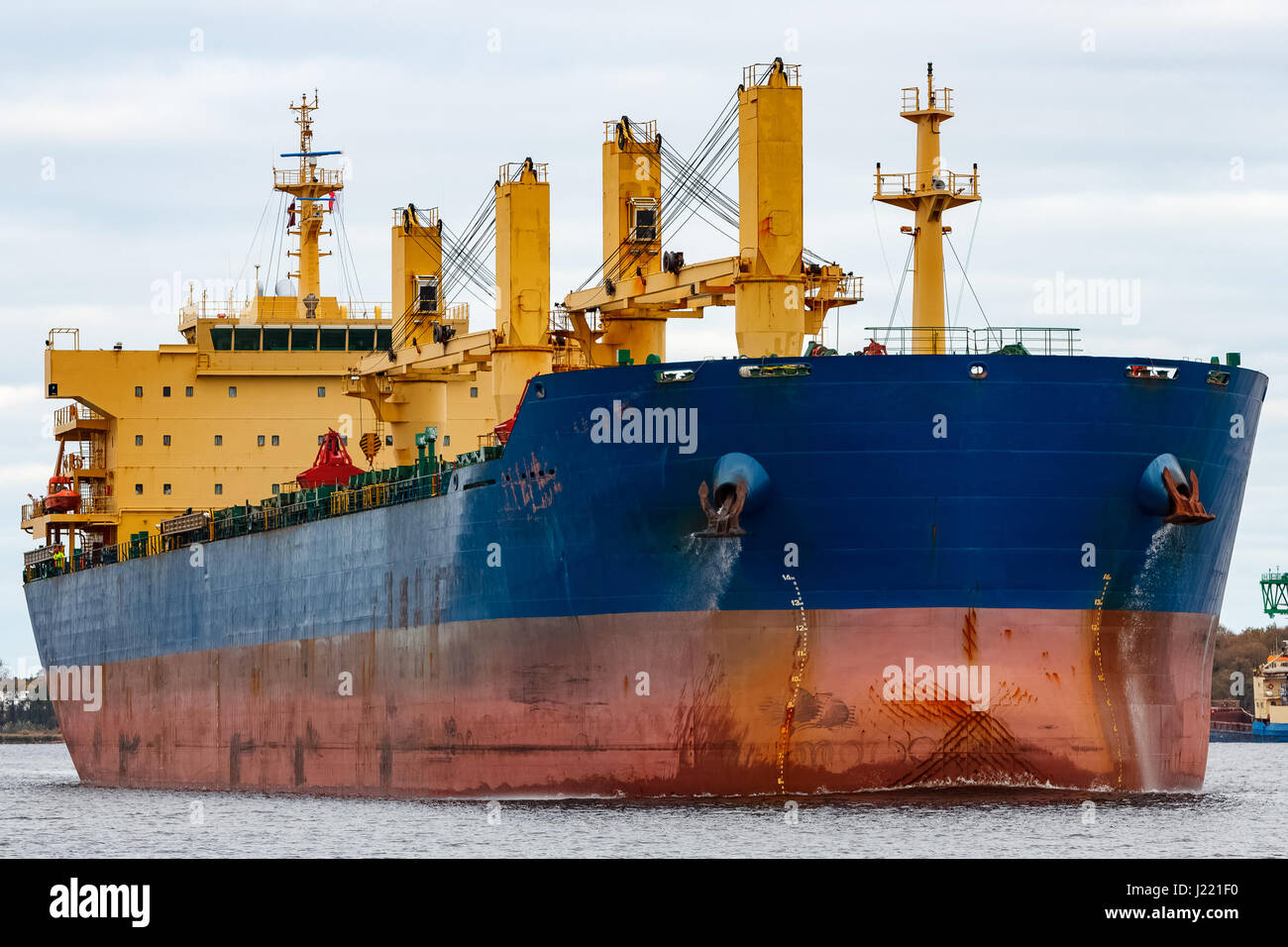 Blue cargo ship entering the port of Riga, Europe Stock Photo - Alamy