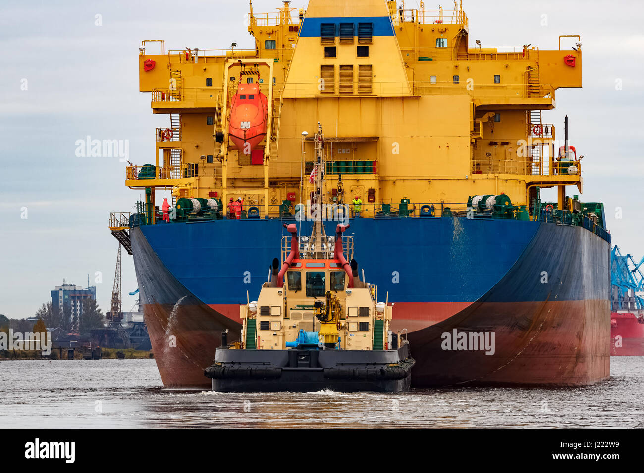Blue cargo ship entering the port of Riga, Europe Stock Photo - Alamy