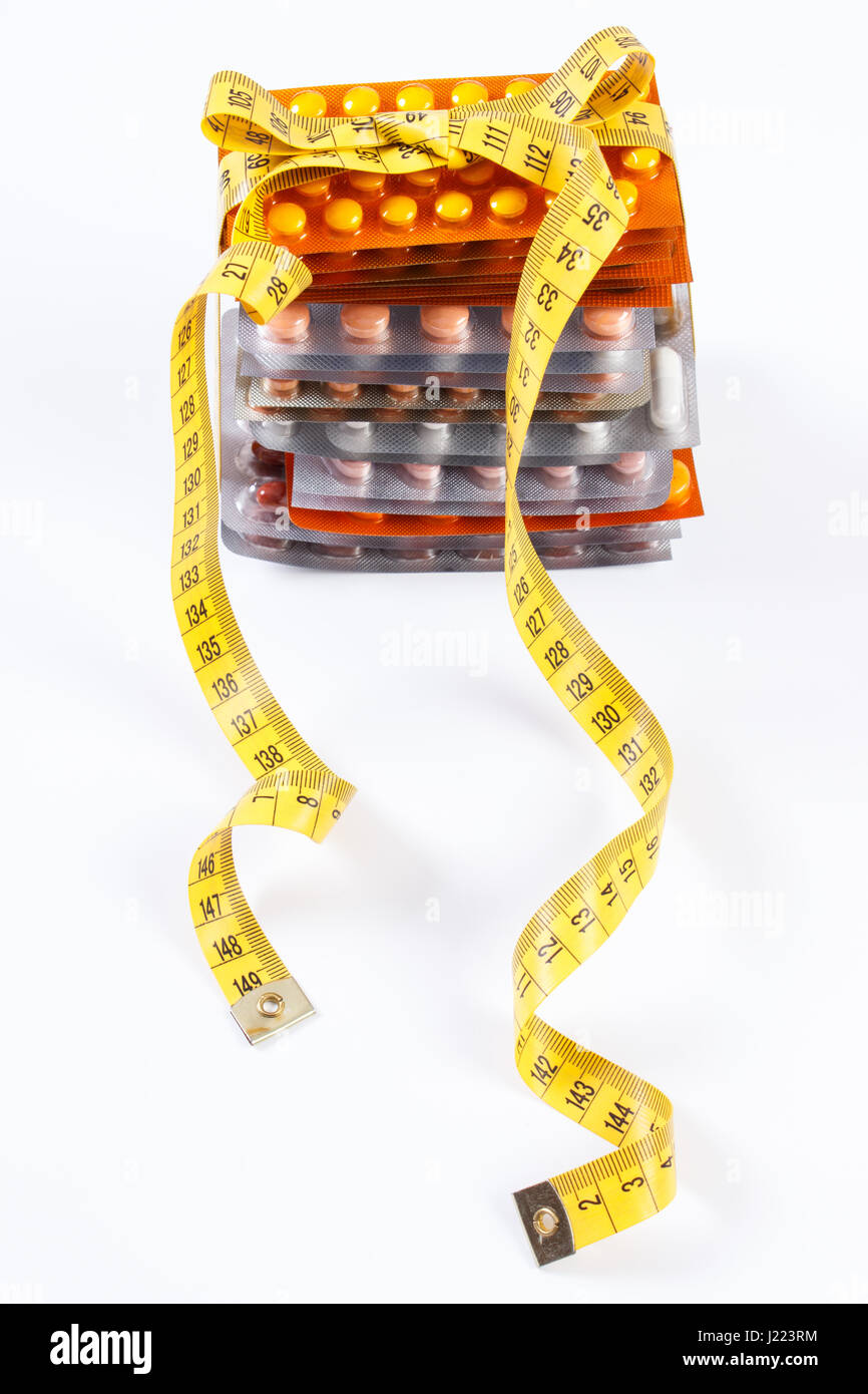 Blisters of medical pills, tablets, capsules or supplements wrapped ...