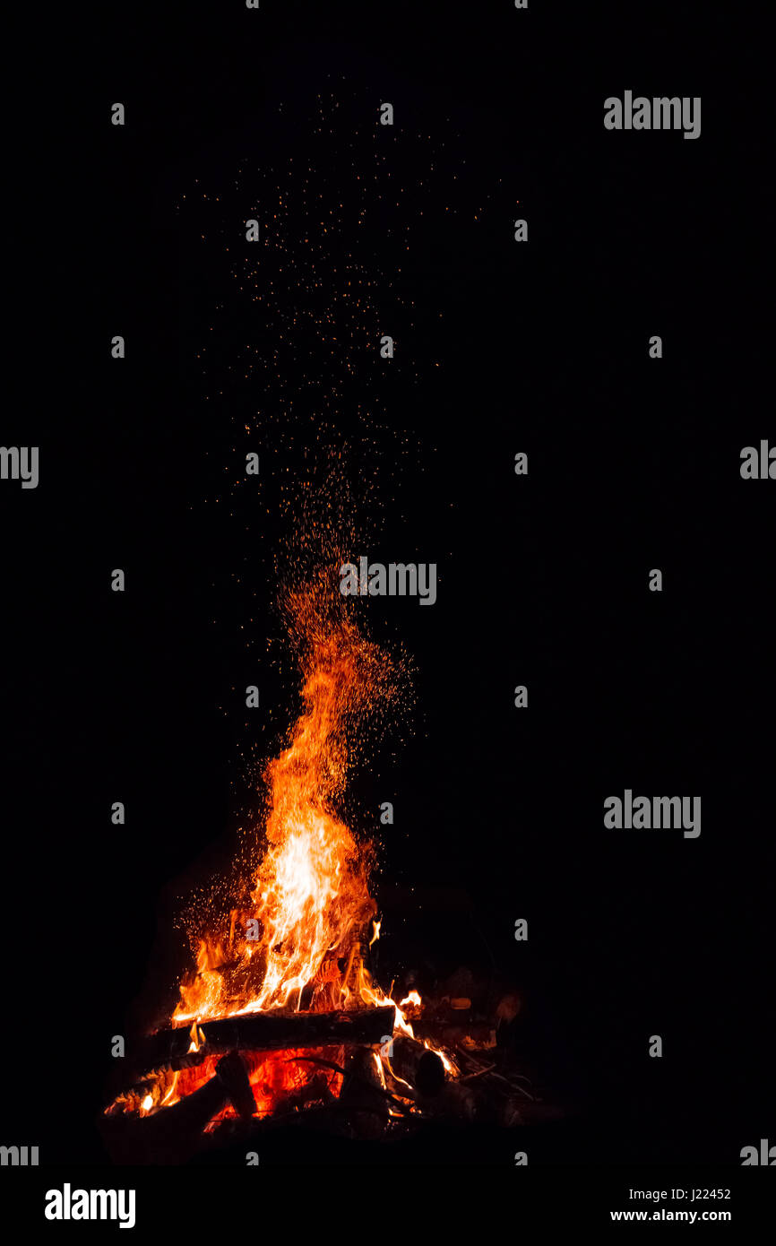 Campfire with flying sparks isolated on black background Stock Photo ...