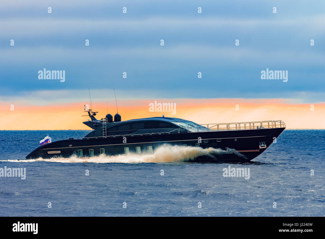 Black elite speed motor boat moving fast from Baltic sea Stock Photo ...