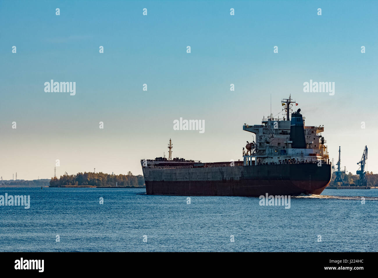 Cargo ship moving entering hi-res stock photography and images - Alamy