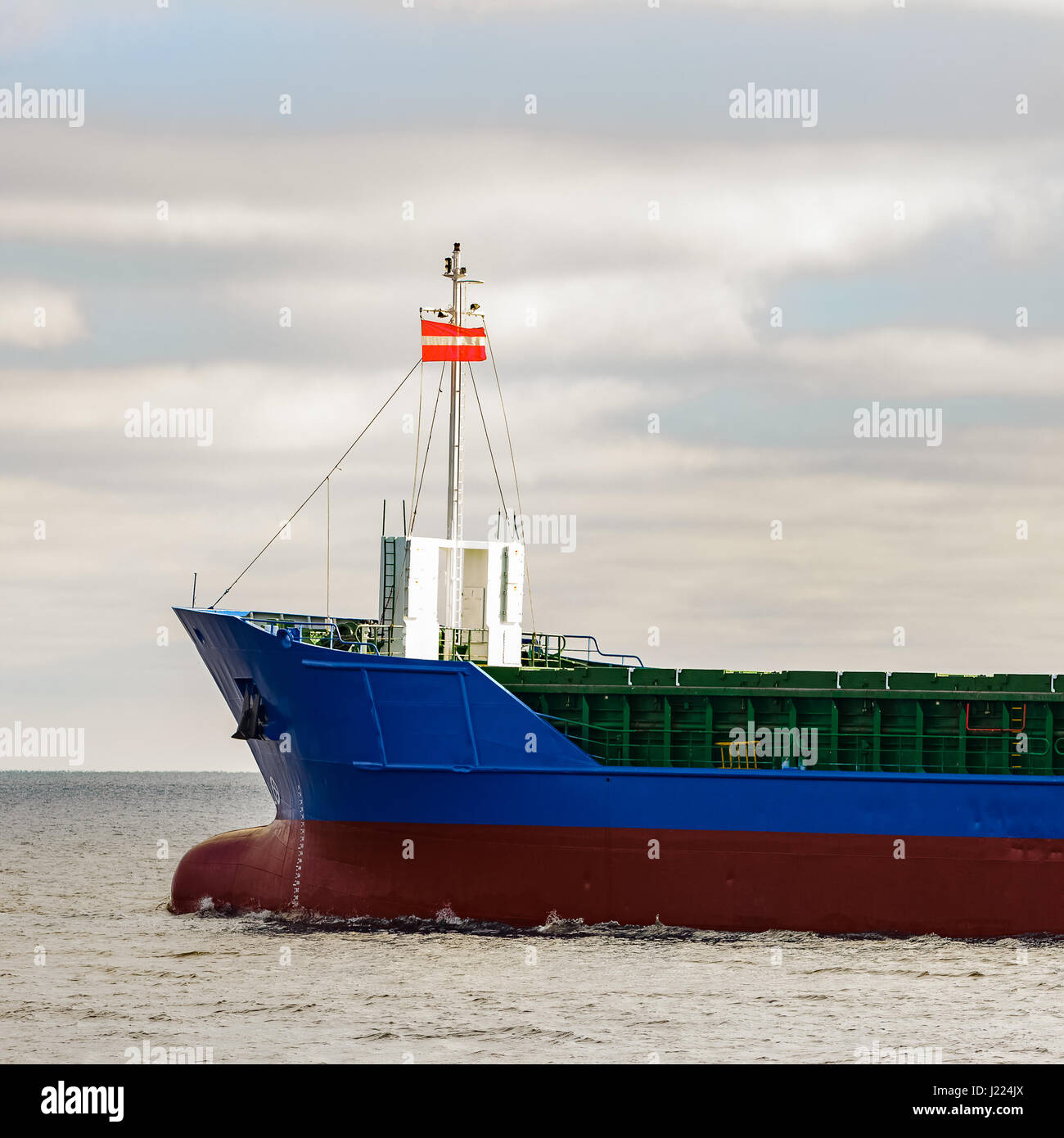 Blue cargo ship's bow leaving the port of Riga Stock Photo - Alamy