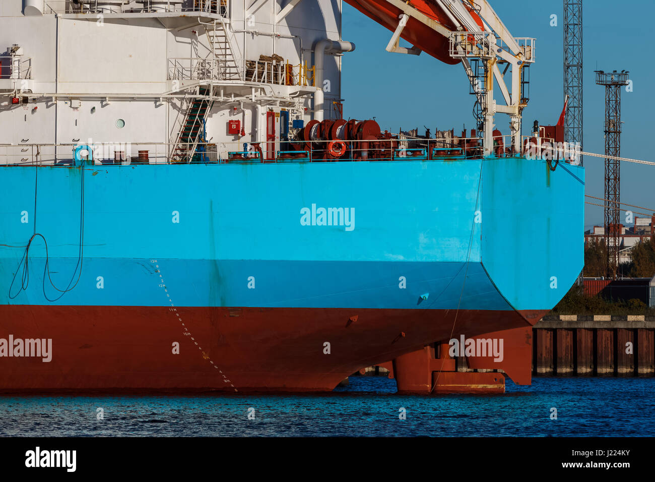 Blue cargo ship loading in the port of Riga, Europe Stock Photo - Alamy