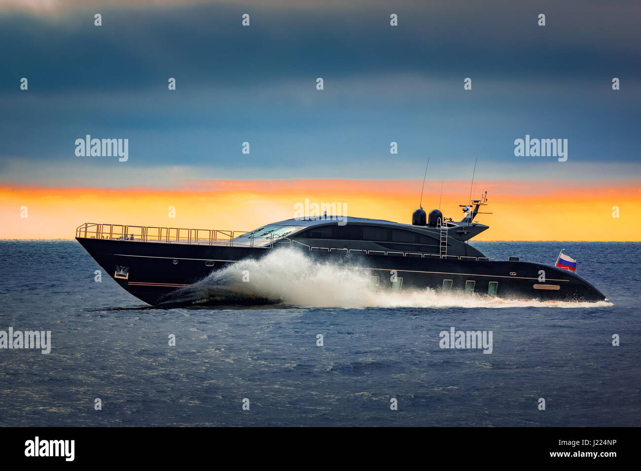 Black elite speed motor boat moving fast from Baltic sea Stock Photo ...