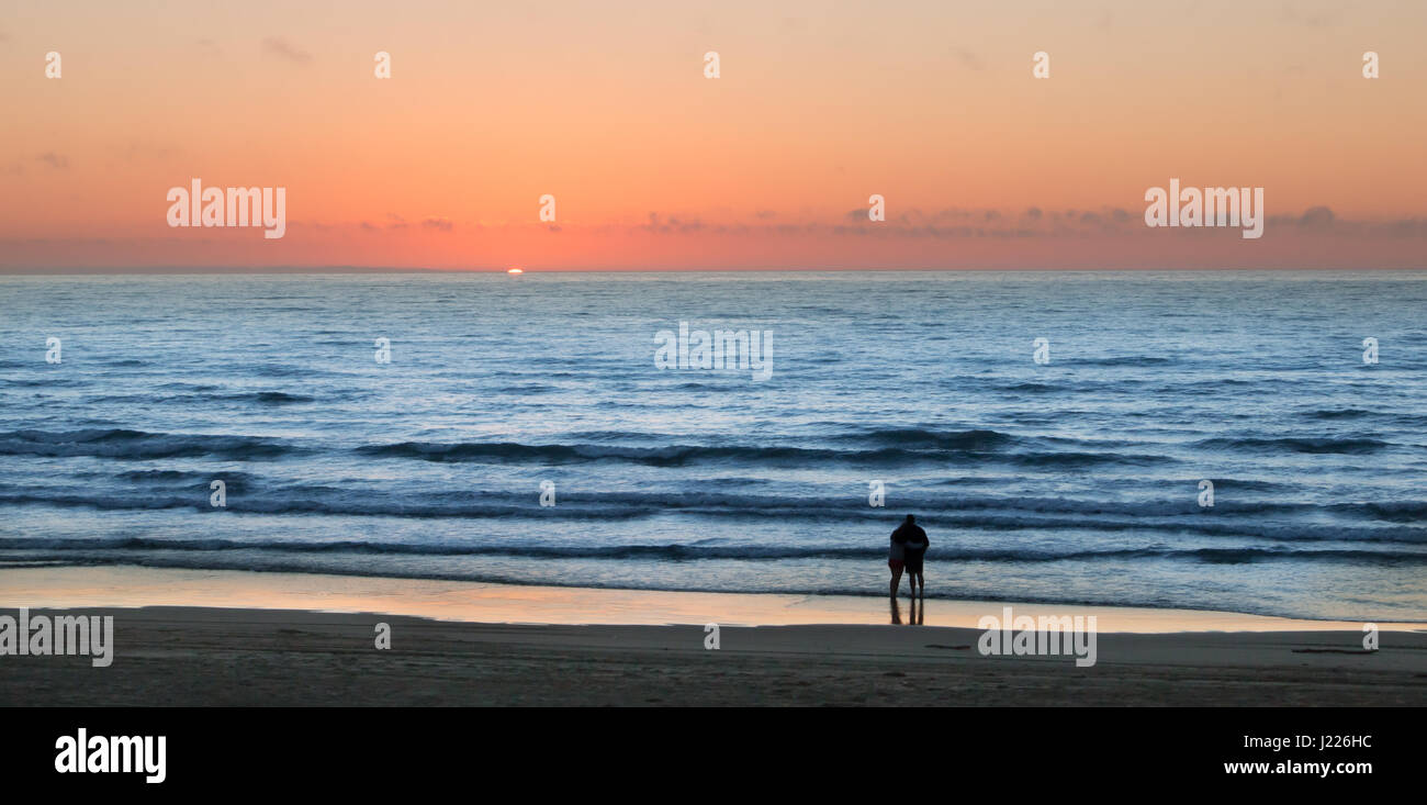 Two people watching the sunset hi-res stock photography and images - Alamy